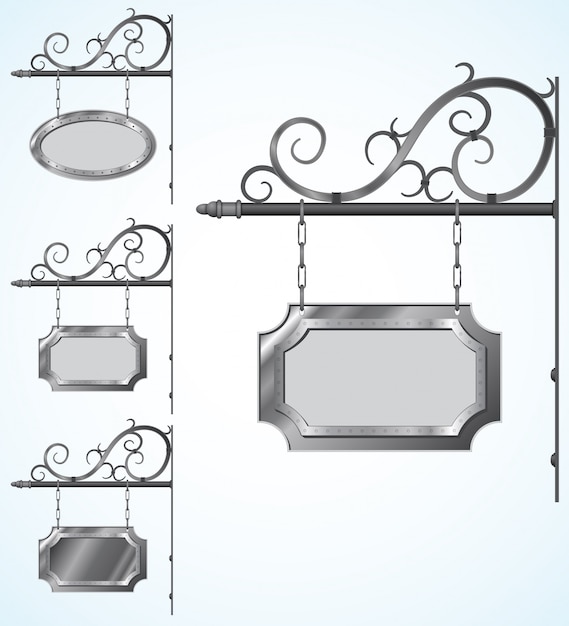 Elegant Wrought Iron Signs with Ornate Frames and Reflective Panels ...