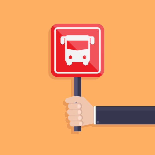 Red Bus Stop Sign Held by Businessman's Hand | Jiffy Designs