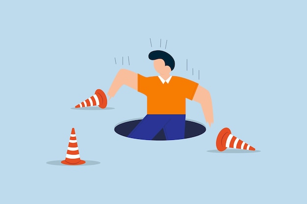 Frustrated construction worker placing traffic cones in the rain ...